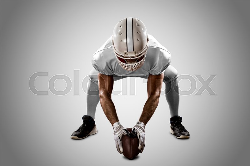 Football Player with a white uniform on ... | Stock image | Colourbox