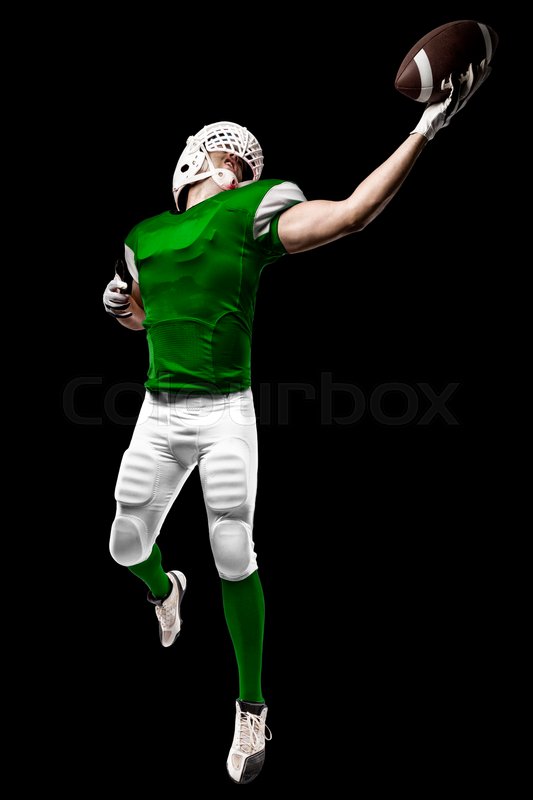 Football Player with a Green uniform ... | Stock image | Colourbox