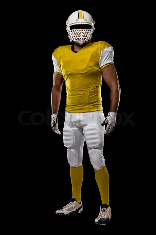 Football Player with a yellow uniform ... | Stock image | Colourbox