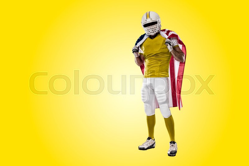Football Player with a yellow uniform ... | Stock image | Colourbox