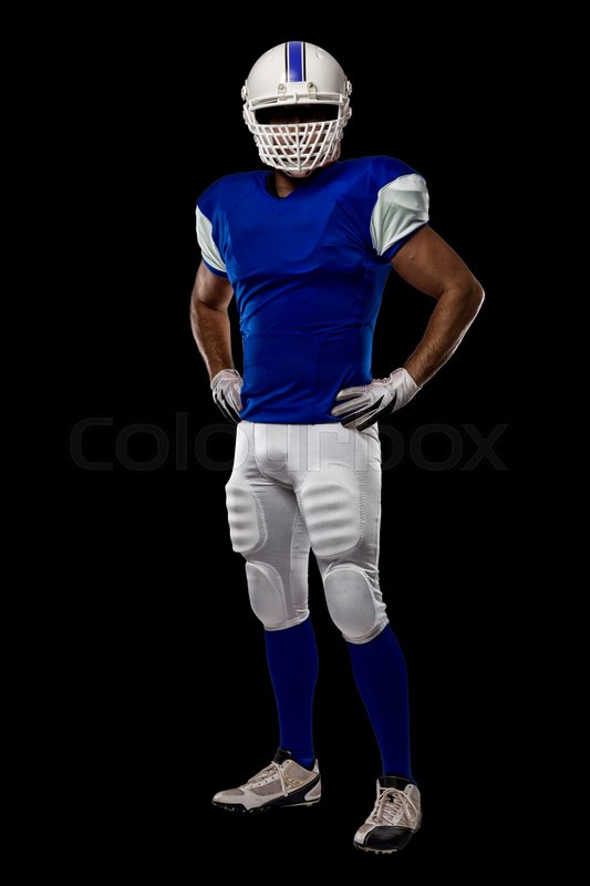 Football Player with a blue uniform on ... | Stock image | Colourbox