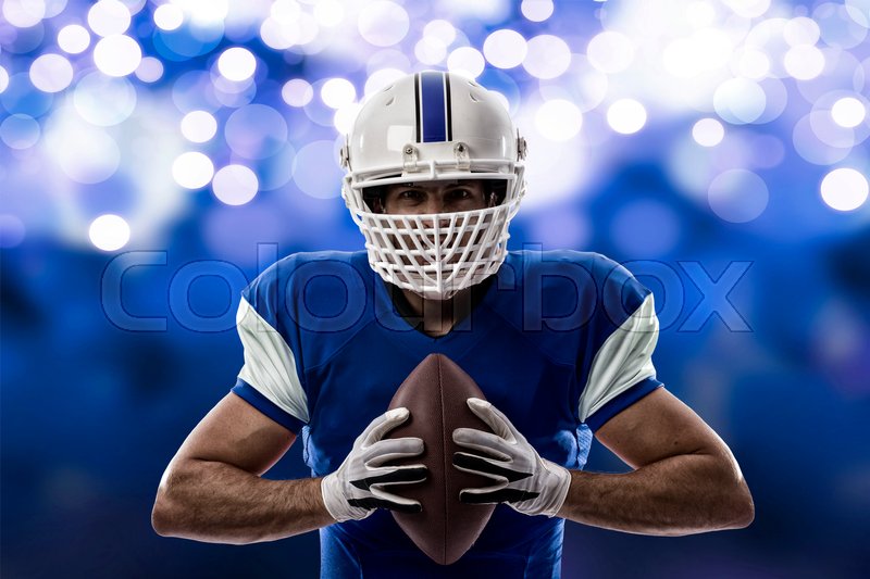 Football Player with a blue uniform on ... | Stock image | Colourbox