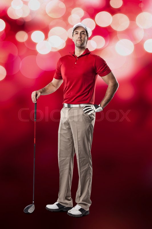 Golf Player in a red shirt standing on ... | Stock image | Colourbox