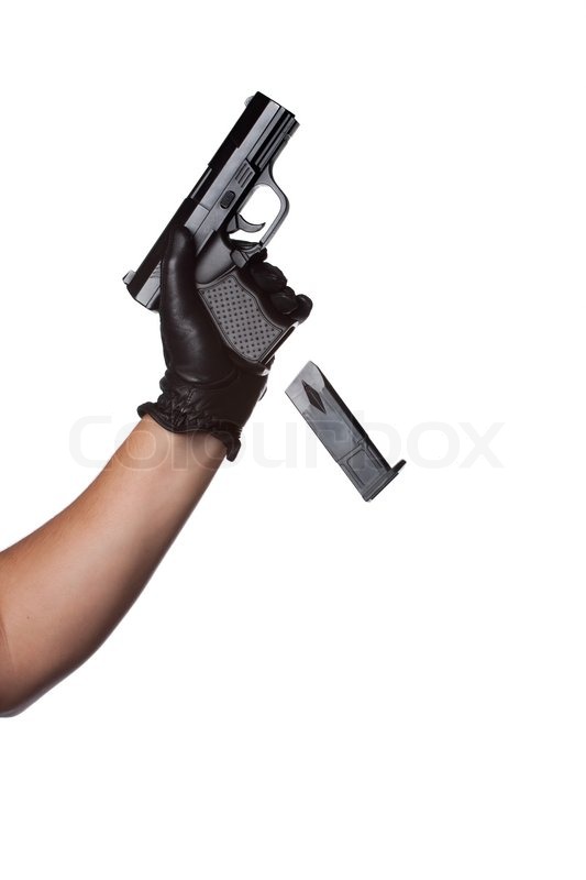 A man reloading a weapon drops the clip ... | Stock image | Colourbox