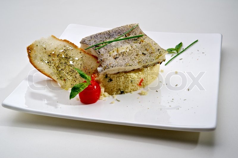 Pike-perch fillet garnished with ... | Stock image | Colourbox