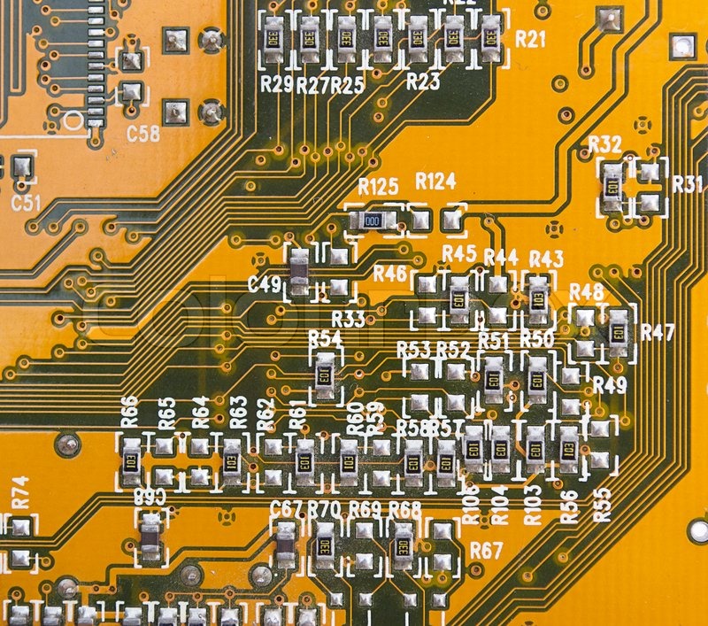 Yellow circuit board with components | Stock image | Colourbox
