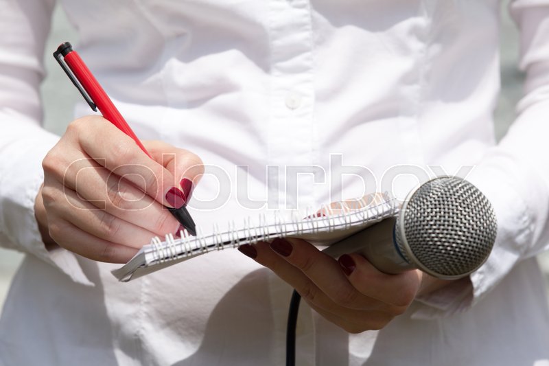 News Journalist Taking Notes
