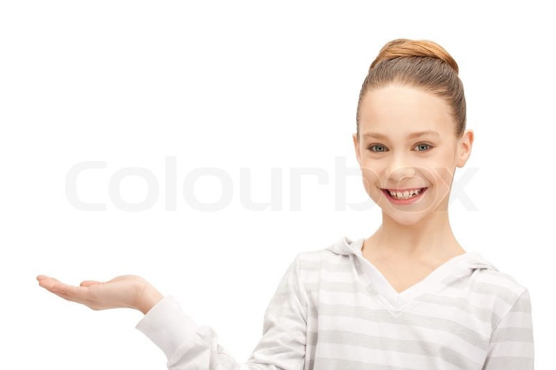 Teenage girl showing something on the ... | Stock image | Colourbox