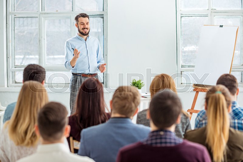 Speaker at Business Meeting in the ... | Stock image | Colourbox