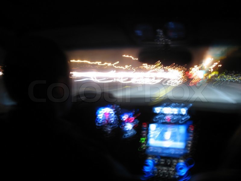 Driving at night in a modern luxury ... | Stock image | Colourbox