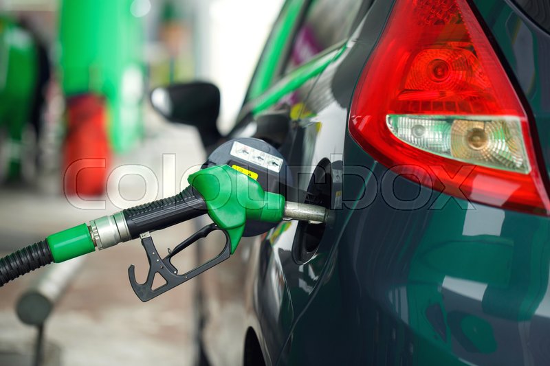 Car refueling on a petrol station in ... | Stock image | Colourbox