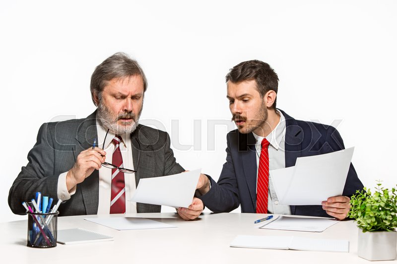 The two colleagues working together at ... | Stock image | Colourbox