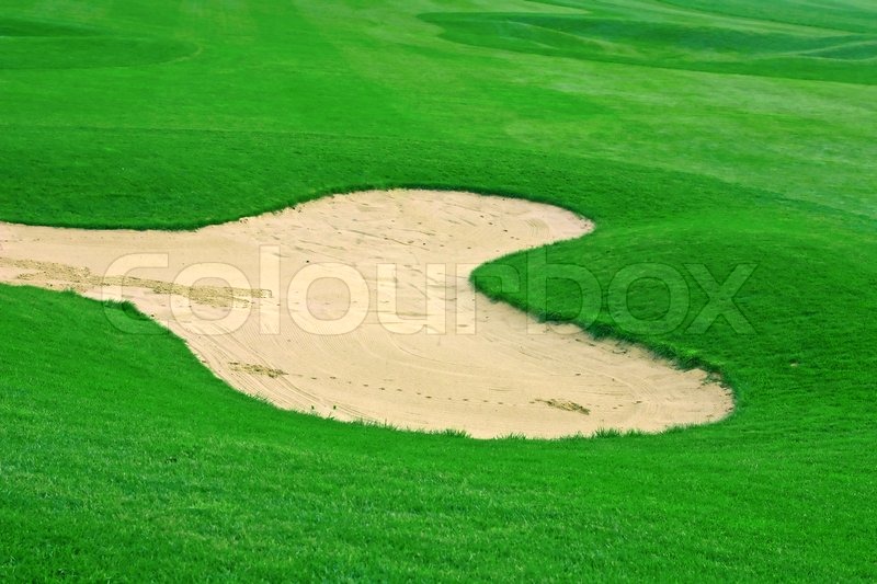 Sand trap on the golf course | Stock image | Colourbox