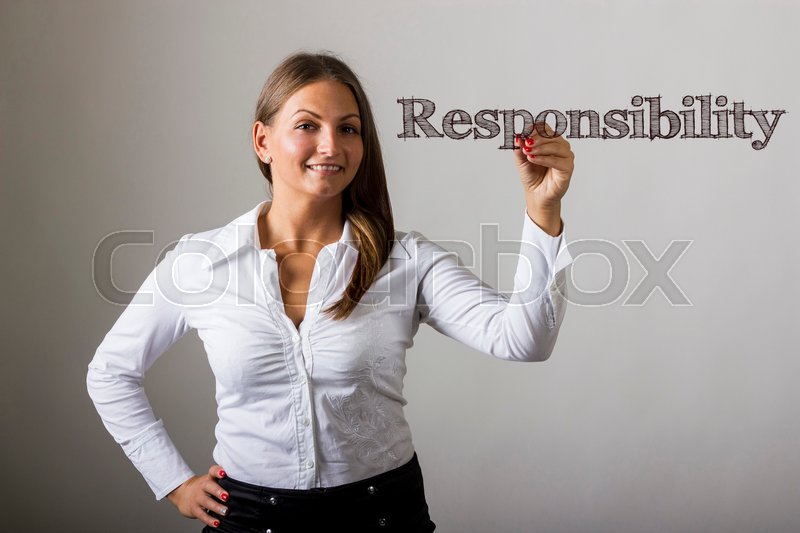 Responsibility - Beautiful girl writing ... | Stock image | Colourbox