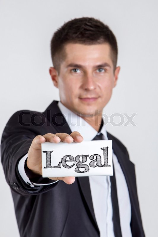 Legal - Young businessman holding a ... | Stock image | Colourbox
