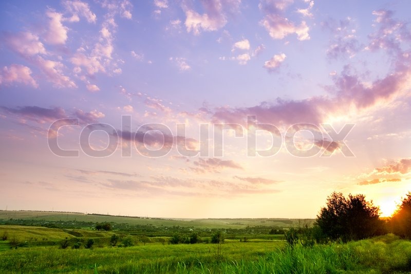 Landskab med en smuk himmel og solskin ... | Stock foto | Colourbox