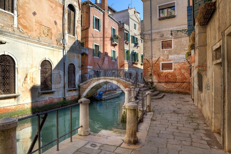 Small bridge over canal and old ... | Stock image | Colourbox