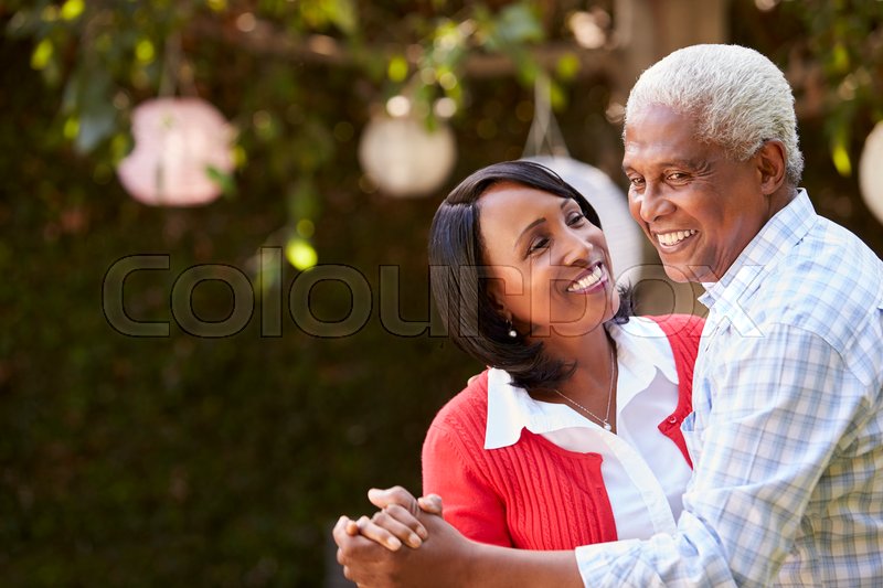 Senior black couple dancing in their ... | Stock image | Colourbox