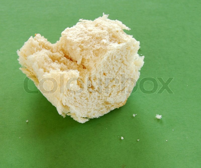 Piece of white bread without crust over ... | Stock image | Colourbox