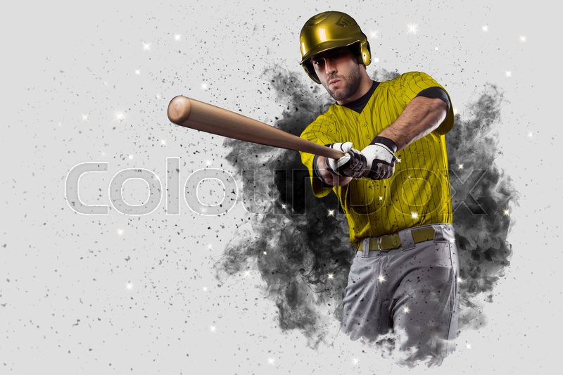 Baseball Player with a yellow uniform ... | Stock image | Colourbox