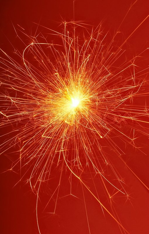 Beautiful fireworks sparkler on red ... | Stock image | Colourbox