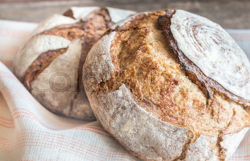 Two loaves of bread on the ... | Stock image | Colourbox
