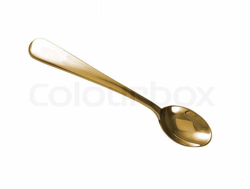 Gold spoon isolated on a white ... | Stock image | Colourbox