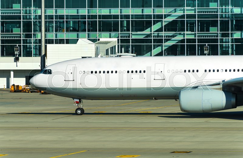 Side View of airplane on airfield in ... | Stock image | Colourbox