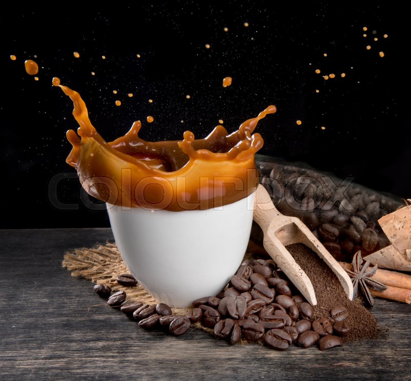 Coffee splash with coffee beans on ... | Stock image | Colourbox
