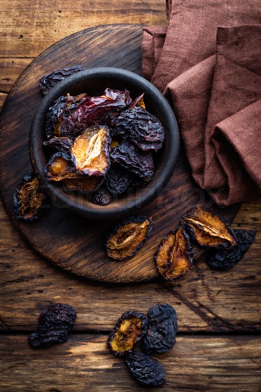 Prune, dried plums fruits on dark ... | Stock image | Colourbox