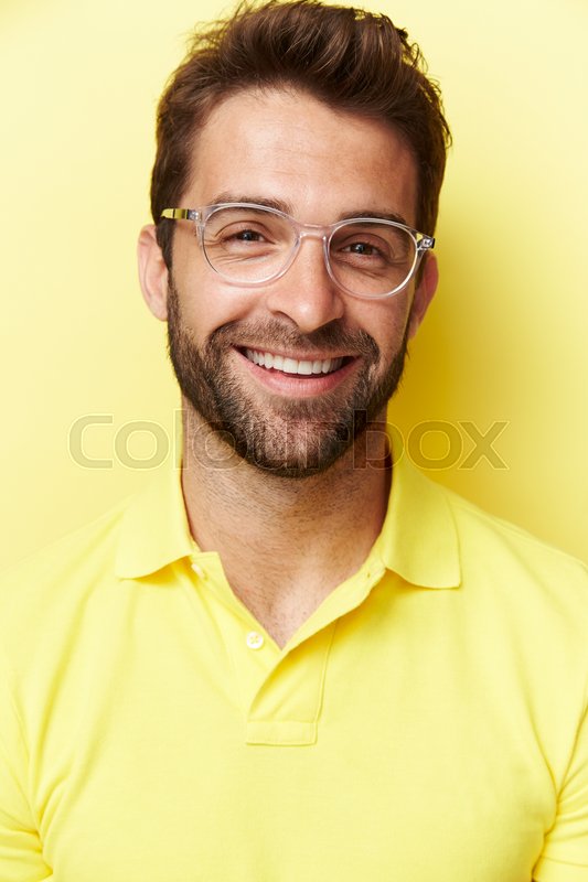 Yellow dude in specs, portrait | Stock image | Colourbox