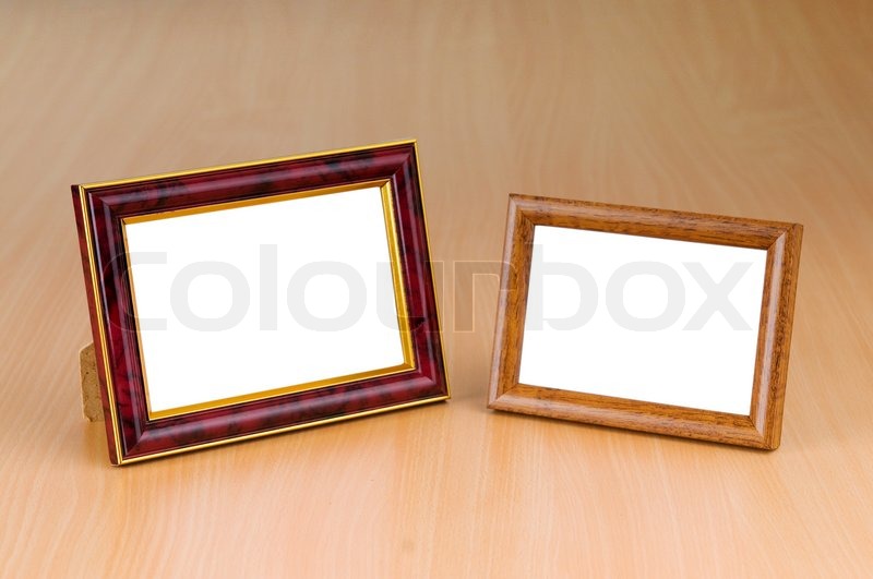 Photo frames on the table | Stock image | Colourbox