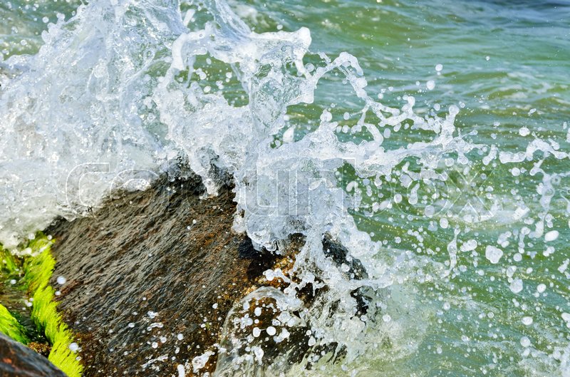 Waves splash on the large boulders on ... | Stock image | Colourbox