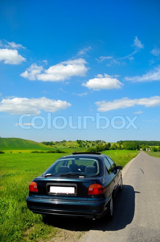 Car is parked in road side with a ... | Stock image | Colourbox