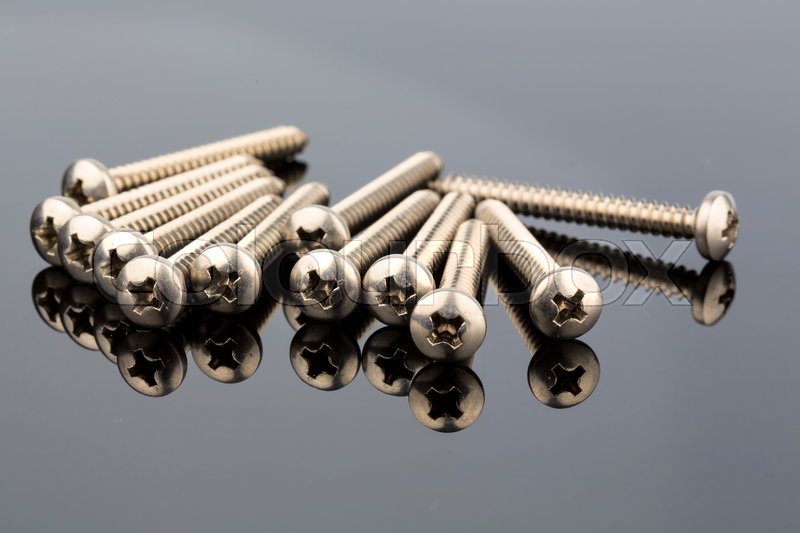 Several screws in the workshop in a ... | Stock image | Colourbox