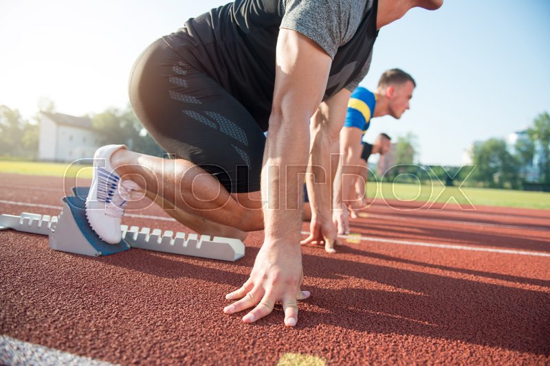 Runners preparing for race at starting ... | Stock image | Colourbox