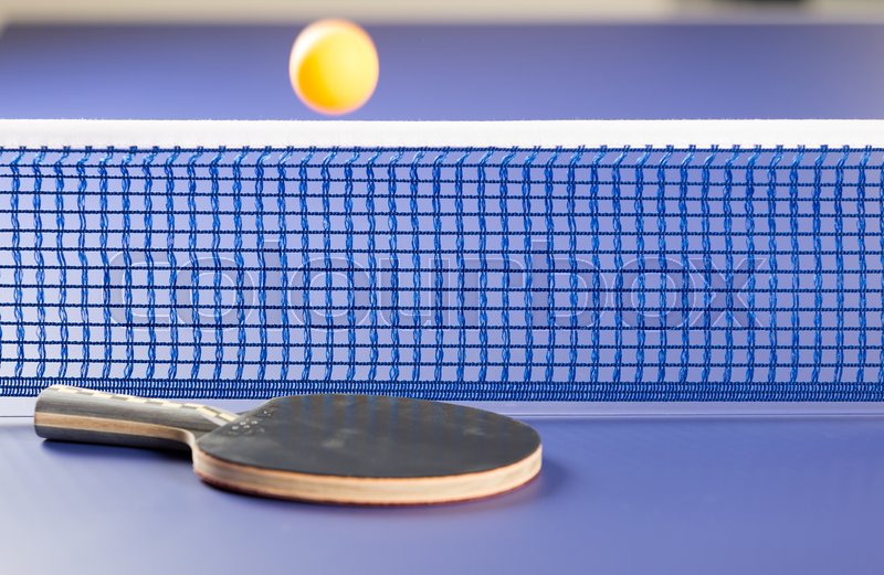 Ping pong racket on the table to play | Stock image | Colourbox