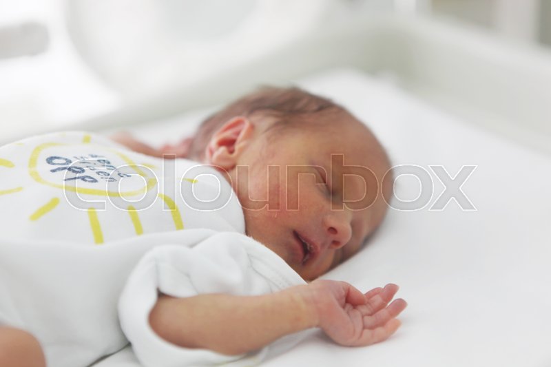 Newborn baby in hospital. | Stock image | Colourbox