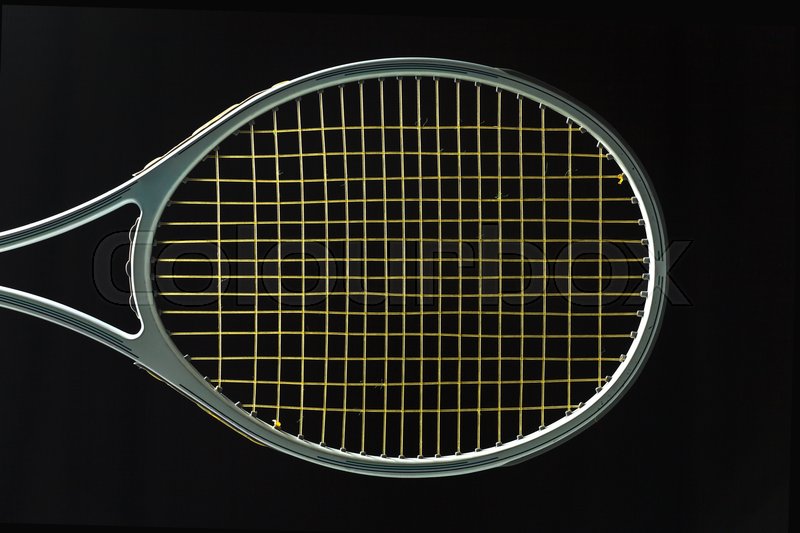 Tennis racket on black background | Stock image | Colourbox