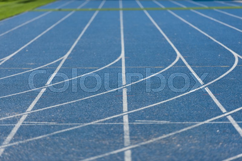 Close up view of blue running track on ... | Stock image | Colourbox