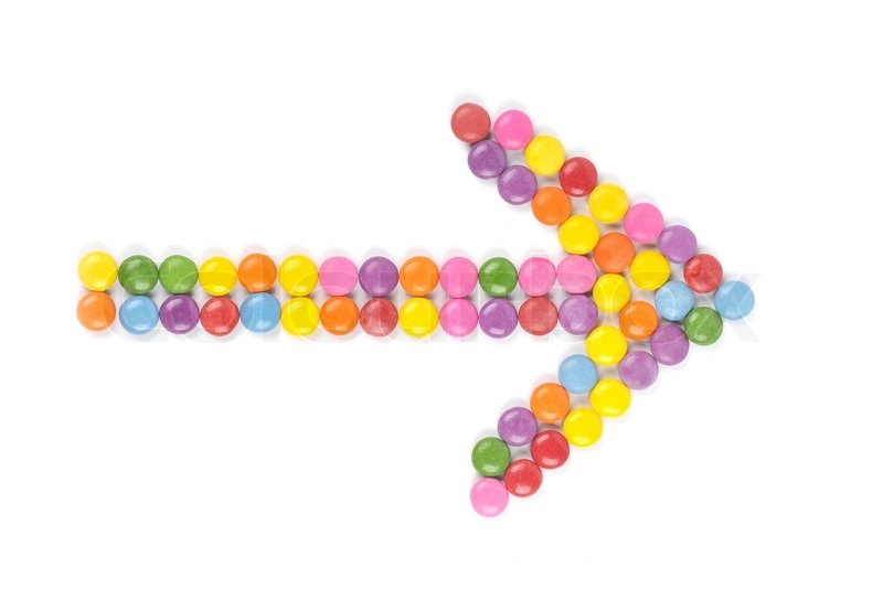 The arrow of candy on a white ... | Stock image | Colourbox