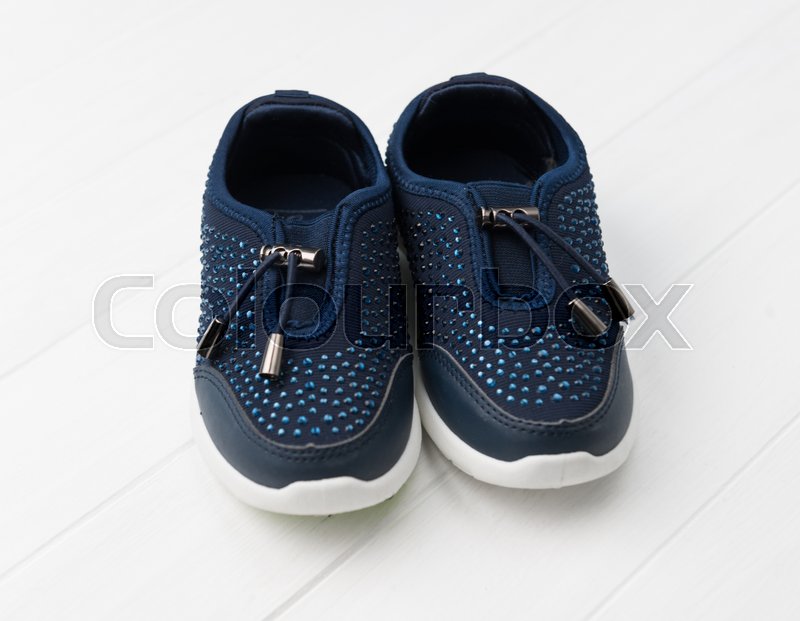 Dark blue sneakers with deep blue ... | Stock image | Colourbox