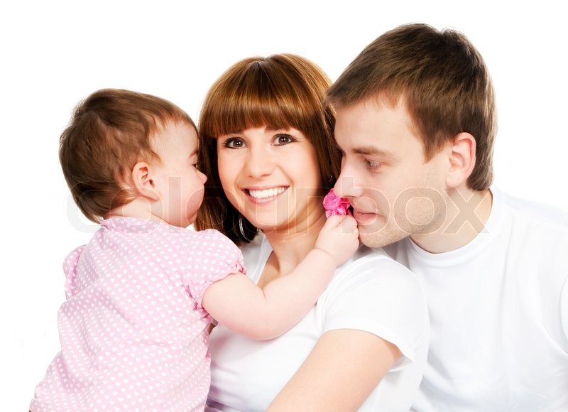 Happy family with a baby on a white ... | Stock image | Colourbox