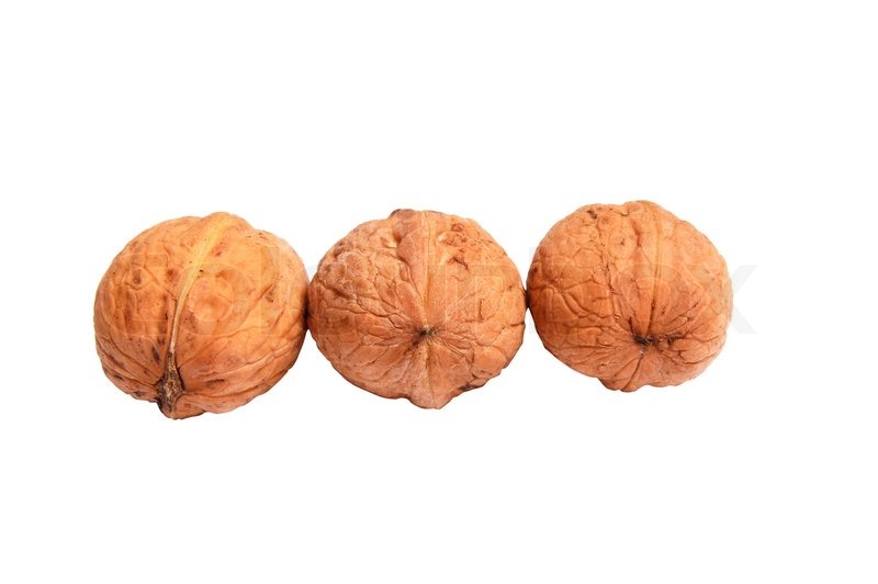 Three nuts isolated on a white ... | Stock image | Colourbox