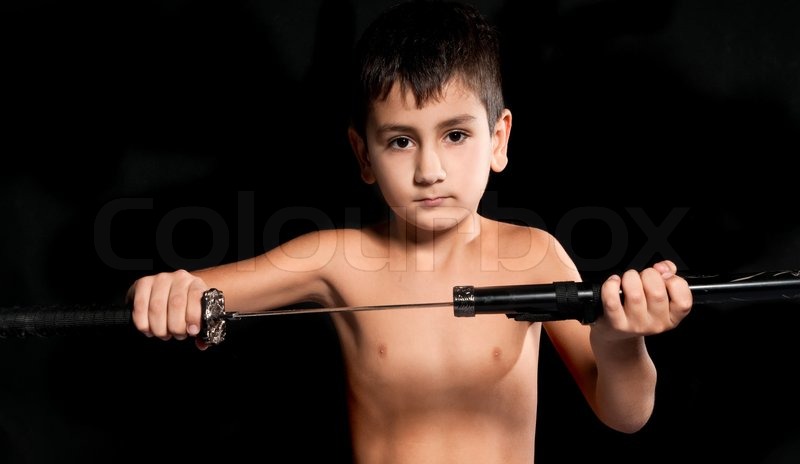 Boy with a samurai sword | Stock image | Colourbox