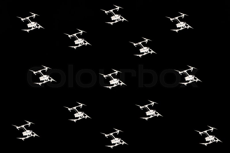 Multiple drones drones pattern hovering ... | Stock image | Colourbox