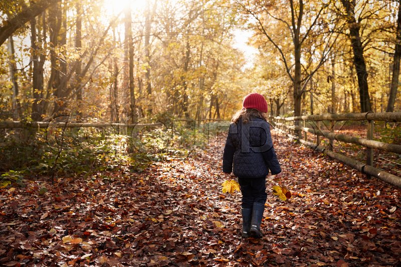Young Girl Walking Along Path Through ... | Stock image | Colourbox