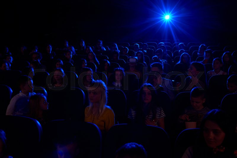 Shot of a dark cinema auditorium full ... | Stock image | Colourbox