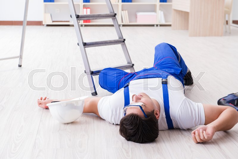 Worker after falling from height - ... | Stock image | Colourbox