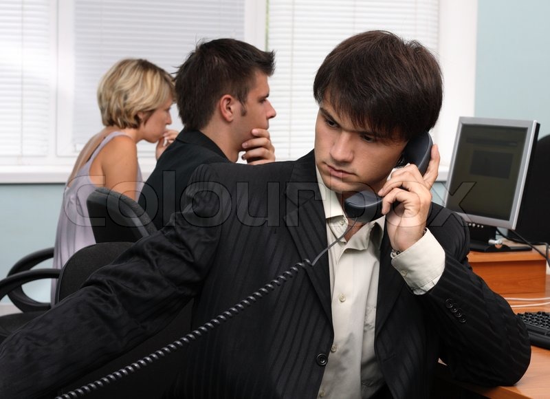 Young businessman making a phone call, ... | Stock image | Colourbox